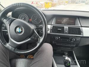 Black BMW X5 2007 in Riga, with an engine capacity of 3.00 L and mileage of 0 thousand km for 7280 €, photo 14 on AUTOMOTO.COM.LV