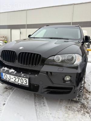 Black BMW X5 2007 in Riga, with an engine capacity of 3.00 L and mileage of 0 thousand km for 7280 €, photo 16 on AUTOMOTO.COM.LV