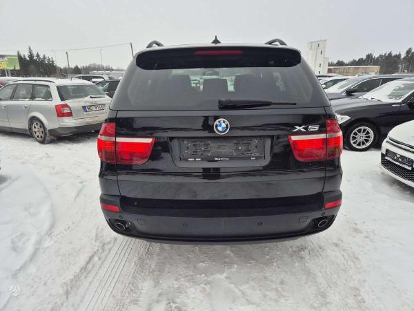 Black BMW X5 2007 in Utena, with an engine capacity of 3.00 L and mileage of 205 thousand km for 8350 €, photo 7 on AUTOMOTO.COM.LV