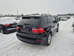 Black BMW X5 2007 in Utena, with an engine capacity of 3.00 L and mileage of 205 thousand km for 8350 €, photo 14 on AUTOMOTO.COM.LV