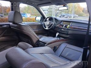 Black BMW X5 2007 in Riga, with an engine capacity of 3.00 L and mileage of 353 thousand km for 9000 €, photo 12 on AUTOMOTO.COM.LV