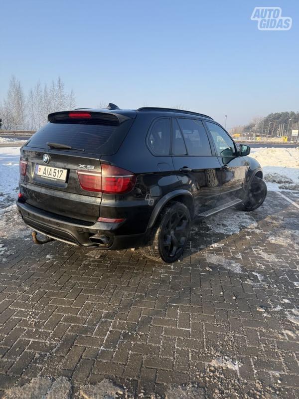 Black BMW X5 2007 in Kaunas, with an engine capacity of 3.00 L and mileage of 560 thousand km for 7999 €, photo 4 on AUTOMOTO.COM.LV