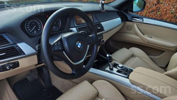 Black BMW X5 2007 in Riga, with an engine capacity of 3.00 L and mileage of 243 thousand km for 7950 €, photo 3 on AUTOMOTO.COM.LV