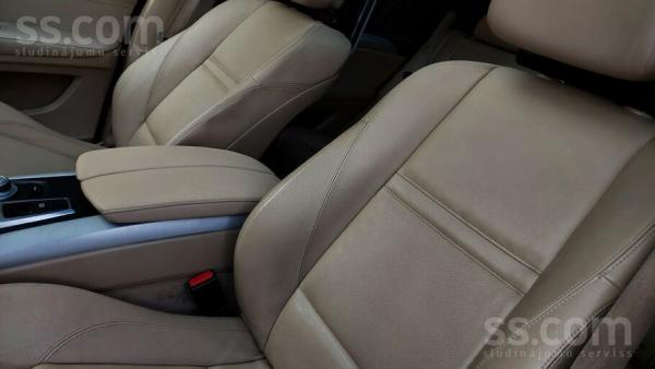 Black BMW X5 2007 in Riga, with an engine capacity of 3.00 L and mileage of 243 thousand km for 7950 €, photo 4 on AUTOMOTO.COM.LV