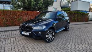 Black BMW X5 2007 in Riga, with an engine capacity of 3.00 L and mileage of 243 thousand km for 7950 €, photo 19 on AUTOMOTO.COM.LV