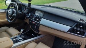 Black BMW X5 2007 in Riga, with an engine capacity of 3.00 L and mileage of 243 thousand km for 7950 €, photo 20 on AUTOMOTO.COM.LV