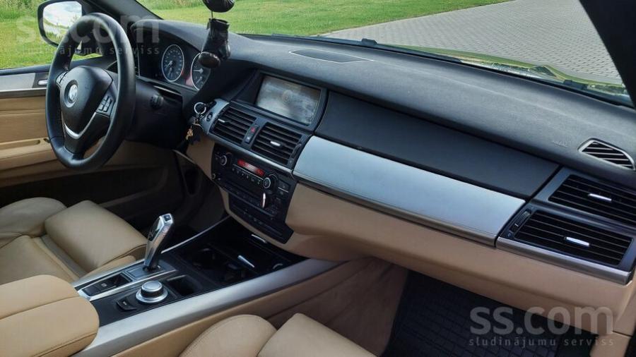 Black BMW X5 2007 in Riga, with an engine capacity of 3.00 L and mileage of 243 thousand km for 7950 €, photo 20 on AUTOMOTO.COM.LV