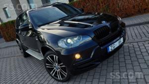 Black BMW X5 2007 in Riga, with an engine capacity of 3.00 L and mileage of 243 thousand km for 7950 €, photo 30 on AUTOMOTO.COM.LV