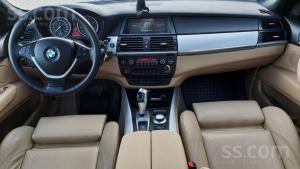 Black BMW X5 2007 in Riga, with an engine capacity of 3.00 L and mileage of 243 thousand km for 7950 €, photo 32 on AUTOMOTO.COM.LV