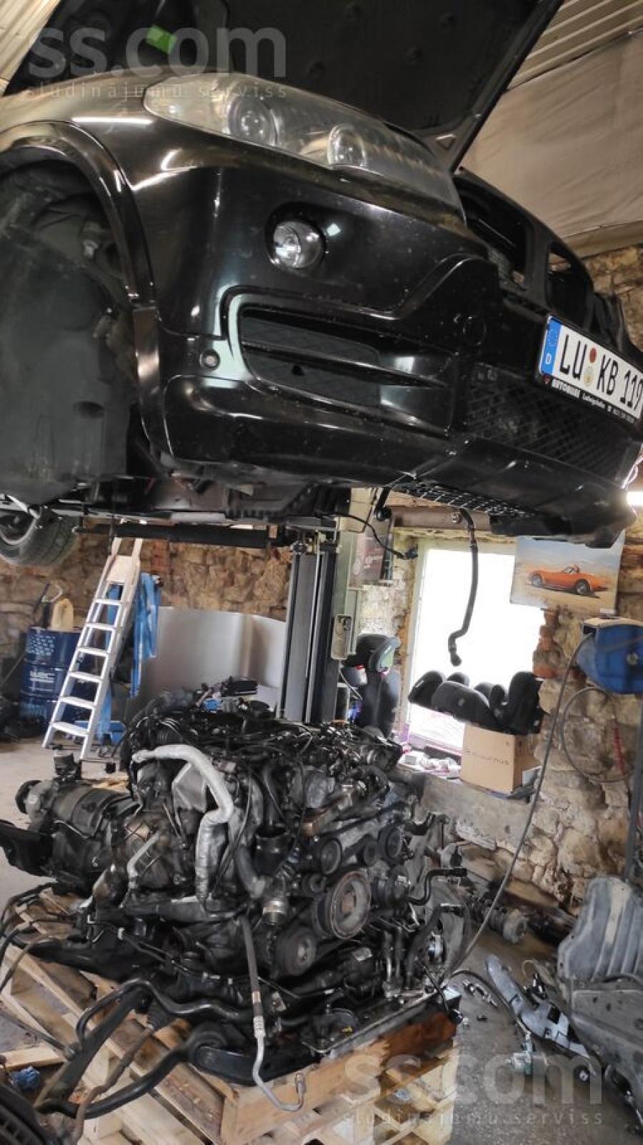 Black BMW X5 2007 in Riga, with an engine capacity of 3.00 L and mileage of 136 thousand km for 9950 €, photo 14 on AUTOMOTO.COM.LV
