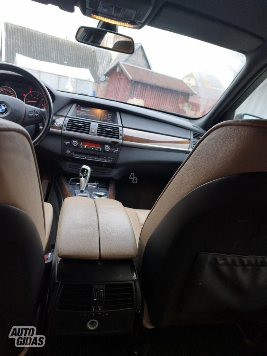 Black BMW X5 2007 in Birzai, with an engine capacity of 3.00 L and mileage of 283 thousand km for 7999 €, photo 33 on AUTOMOTO.COM.LV