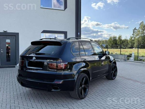 Black BMW X5 2007 in Jelgava, with an engine capacity of 3.00 L and mileage of 312 thousand km for 10999 €, photo 4 on AUTOMOTO.COM.LV