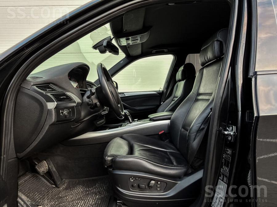 Black BMW X5 2007 in Riga, with an engine capacity of 3.00 L and mileage of 320 thousand km for 12500 €, photo 14 on AUTOMOTO.COM.LV