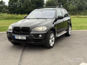 Black BMW X5 2007 in Riga, with an engine capacity of 4.80 L and mileage of 315 thousand km for 6600 €, photo  on AUTOMOTO.COM.LV