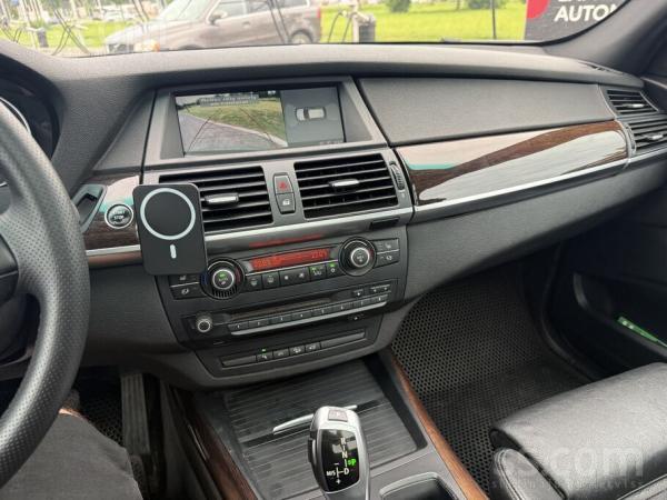 Black BMW X5 2007 in Riga, with an engine capacity of 4.80 L and mileage of 315 thousand km for 6600 €, photo 6 on AUTOMOTO.COM.LV