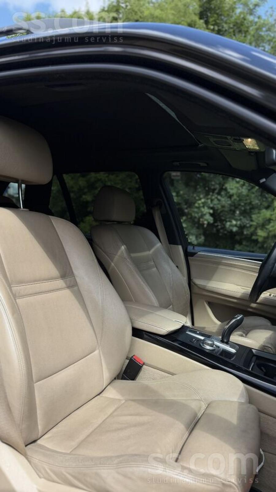 Black BMW X5 2007 in Riga, with an engine capacity of 3.00 L and mileage of 264 thousand km for 8800 €, photo 12 on AUTOMOTO.COM.LV