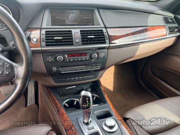 Black BMW X5 2007 in Tartu, with an engine capacity of 4.80 L and mileage of 313 thousand km for 8999 €, photo 8 on AUTOMOTO.COM.LV