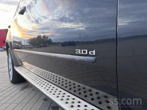 Black BMW X5 2007 in Riga, with an engine capacity of 3.00 L and mileage of 311 thousand km for 8350 €, photo 11 on AUTOMOTO.COM.LV