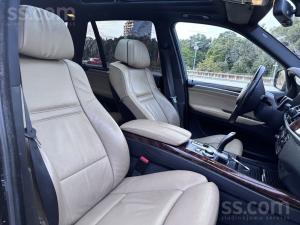 Black BMW X5 2007 in Riga, with an engine capacity of 3.00 L and mileage of 311 thousand km for 8350 €, photo 14 on AUTOMOTO.COM.LV