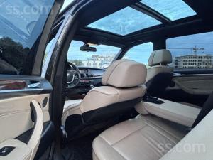 Black BMW X5 2007 in Riga, with an engine capacity of 3.00 L and mileage of 311 thousand km for 8350 €, photo 19 on AUTOMOTO.COM.LV