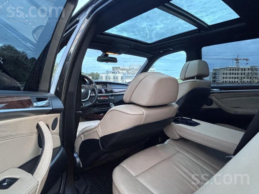 Black BMW X5 2007 in Riga, with an engine capacity of 3.00 L and mileage of 311 thousand km for 8350 €, photo 19 on AUTOMOTO.COM.LV