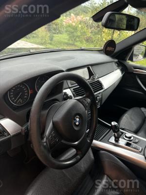 Black BMW X5 2007 in Riga, with an engine capacity of 3.00 L and mileage of 249 thousand km for 8200 €, photo 9 on AUTOMOTO.COM.LV