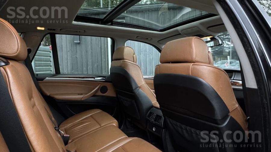 Black BMW X5 2007 in Riga, with an engine capacity of 3.00 L and mileage of 242 thousand km for 7850 €, photo 12 on AUTOMOTO.COM.LV
