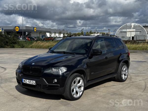 Black BMW X5 2007 in Liepaja, with an engine capacity of 3.00 L and mileage of 447 thousand km for 6890 €, photo 1 on AUTOMOTO.COM.LV
