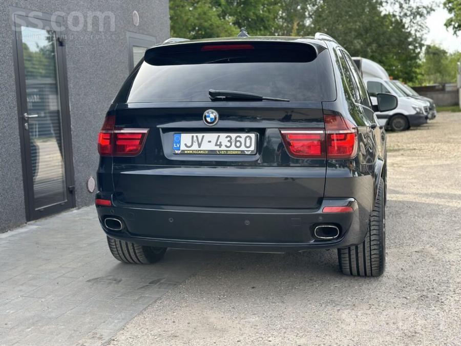 Black BMW X5 2008 in Riga, with an engine capacity of 3.00 L and mileage of 321 thousand km for 11000 €, photo 7 on AUTOMOTO.COM.LV