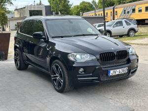 Black BMW X5 2008 in Riga, with an engine capacity of 3.00 L and mileage of 321 thousand km for 11000 €, photo 10 on AUTOMOTO.COM.LV