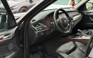 Black BMW X5 2008 in Riga, with an engine capacity of 3.00 L and mileage of 278 thousand km for 8280 €, photo 19 on AUTOMOTO.COM.LV