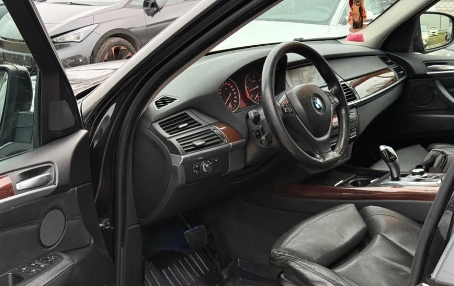Black BMW X5 2008 in Riga, with an engine capacity of 3.00 L and mileage of 278 thousand km for 8280 €, photo 19 on AUTOMOTO.COM.LV