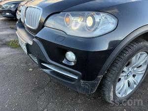 Black BMW X5 2008 in Riga, with an engine capacity of 4.80 L and mileage of 302 thousand km for 4640 €, photo 7 on AUTOMOTO.COM.LV