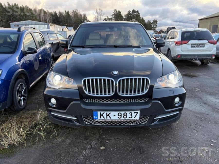 Black BMW X5 2008 in Riga, with an engine capacity of 4.80 L and mileage of 302 thousand km for 4640 €, photo 8 on AUTOMOTO.COM.LV