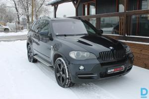 Black BMW X5 2008 in Riga, with an engine capacity of 3.00 L and mileage of 312 thousand km for 8490 €, photo 3 on AUTOMOTO.COM.LV