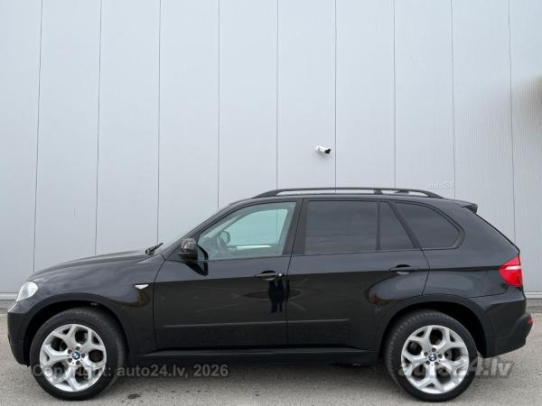 Black BMW X5 2008 in Tartu, with an engine capacity of 3.00 L and mileage of 262 thousand km for 9499 €, photo 4 on AUTOMOTO.COM.LV