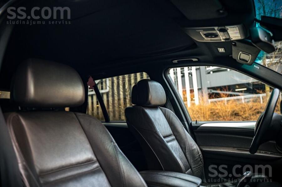 Black BMW X5 2008 in Riga, with an engine capacity of 3.00 L and mileage of 0 thousand km for 6990 €, photo 9 on AUTOMOTO.COM.LV