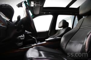 Black BMW X5 2008 in Riga, with an engine capacity of 3.00 L and mileage of 384 thousand km for 9000 €, photo 8 on AUTOMOTO.COM.LV