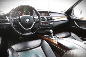 Black BMW X5 2008 in Riga, with an engine capacity of 3.00 L and mileage of 384 thousand km for 9000 €, photo 9 on AUTOMOTO.COM.LV