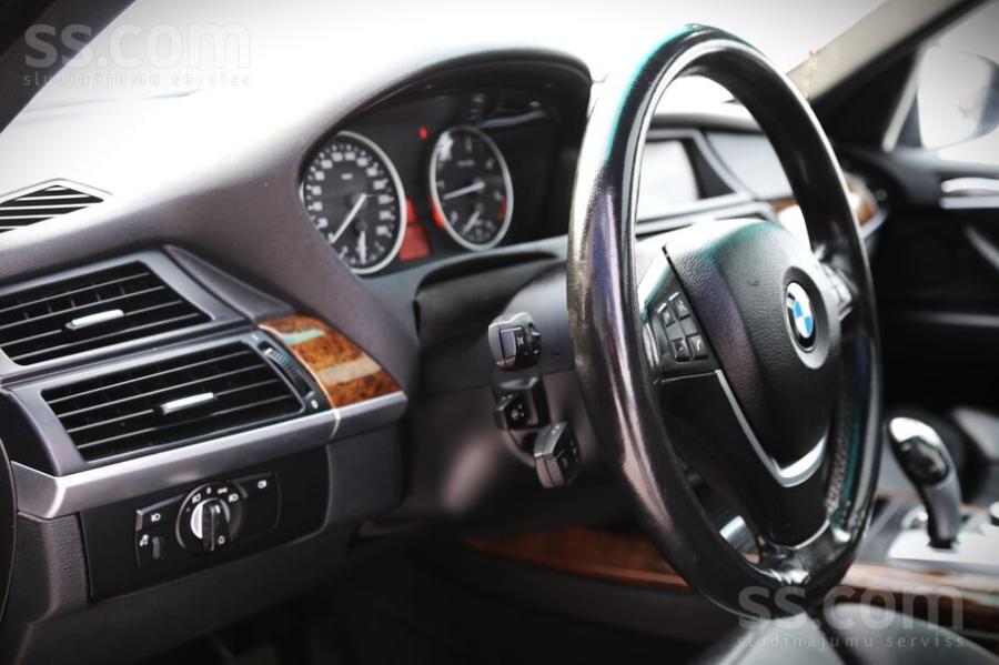 Black BMW X5 2008 in Riga, with an engine capacity of 3.00 L and mileage of 384 thousand km for 9000 €, photo 14 on AUTOMOTO.COM.LV