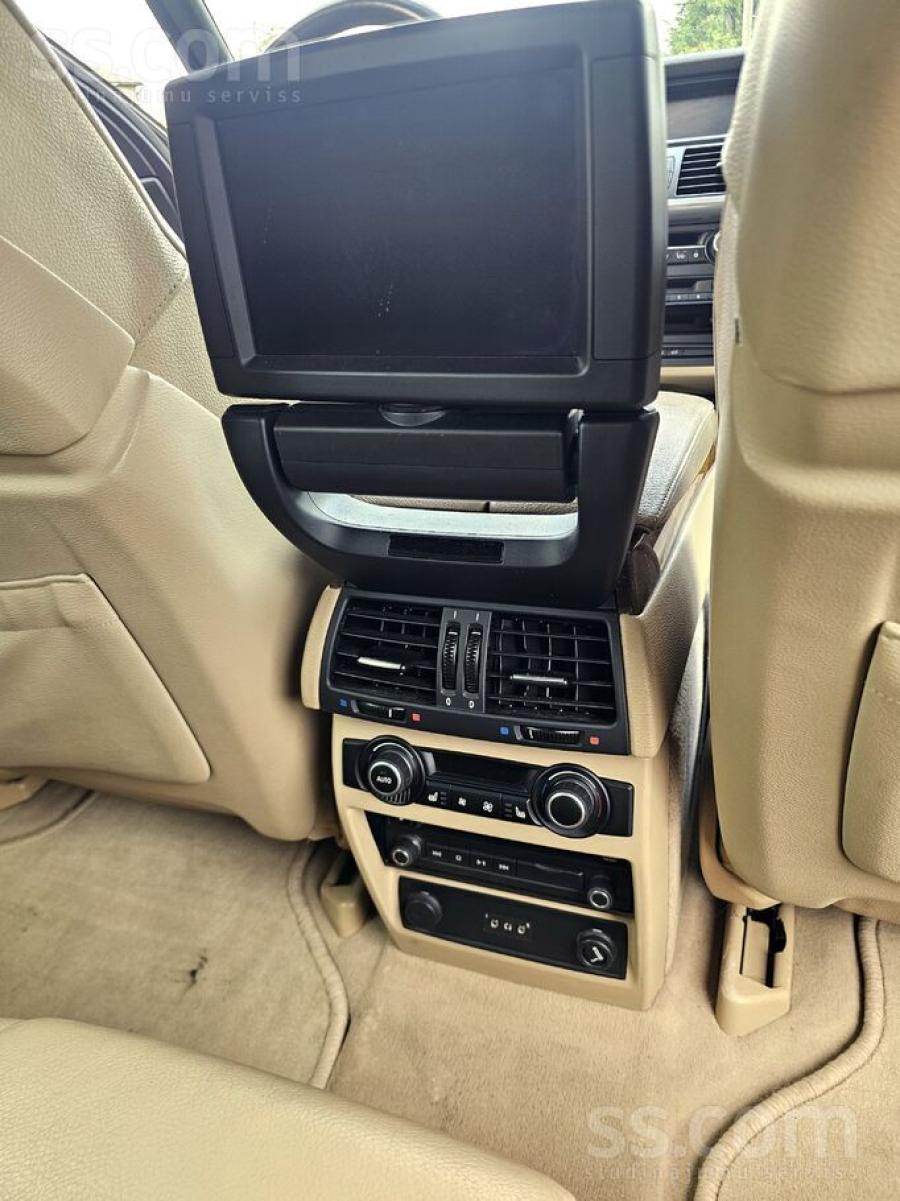 Melns BMW X5 2008 Dobele, ar dzinēja tilpumu 4.80 L un nobraukumu 312 tūkst. km par 8500 €, foto 12 vietnē AUTOMOTO.COM.LV