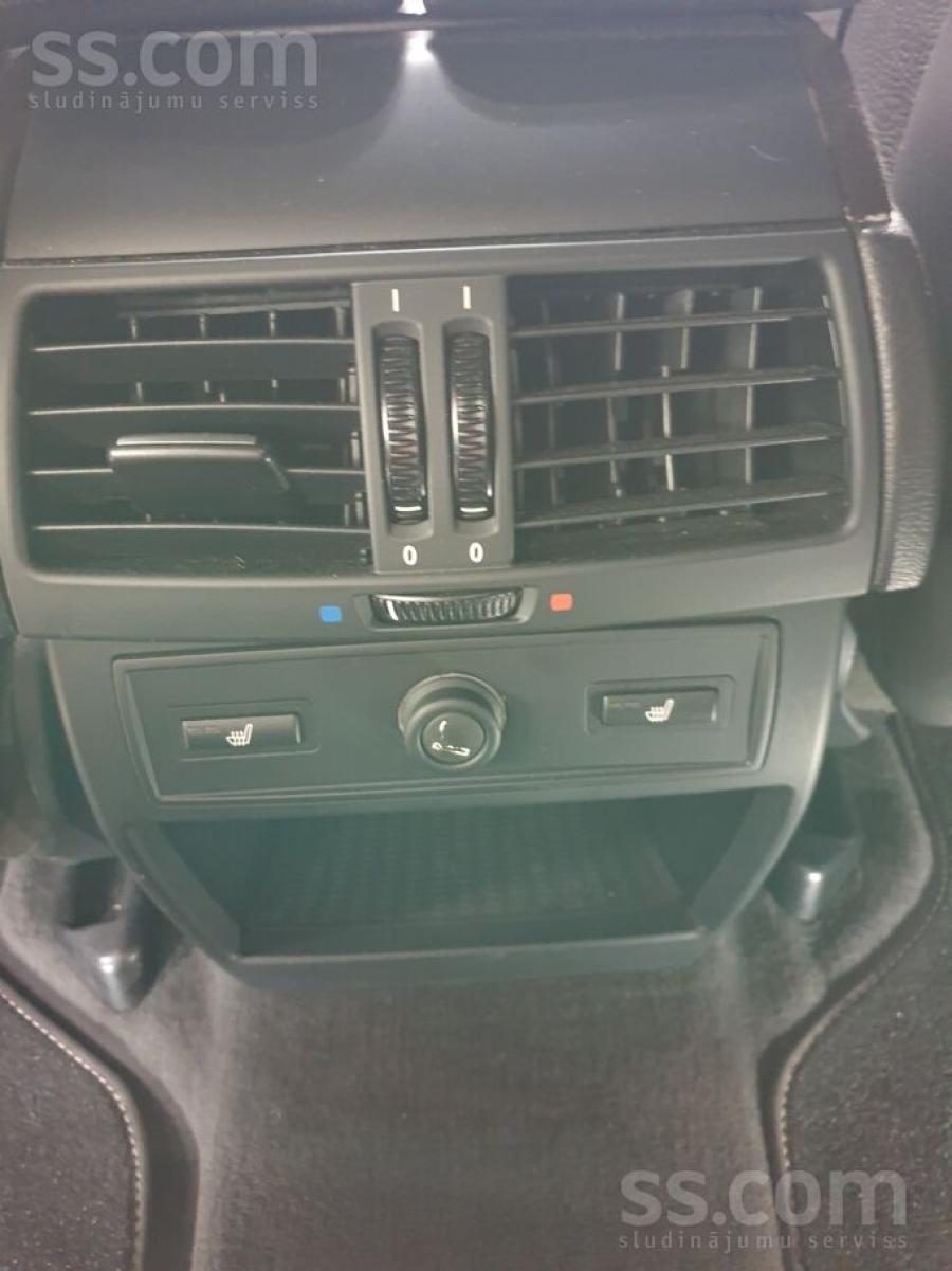 Black BMW X5 2008 in Aluksne, with an engine capacity of 3.00 L and mileage of 0 thousand km for 8500 €, photo 12 on AUTOMOTO.COM.LV