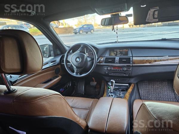 Black BMW X5 2008 in Riga, with an engine capacity of 3.00 L and mileage of 339 thousand km for 7300 €, photo 8 on AUTOMOTO.COM.LV