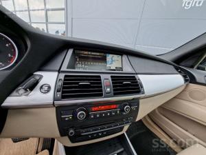 Black BMW X5 2008 in Valmiera, with an engine capacity of 3.00 L and mileage of 255 thousand km for 11480 €, photo 12 on AUTOMOTO.COM.LV