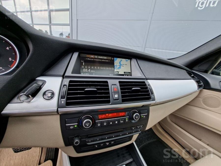 Black BMW X5 2008 in Valmiera, with an engine capacity of 3.00 L and mileage of 255 thousand km for 11480 €, photo 12 on AUTOMOTO.COM.LV