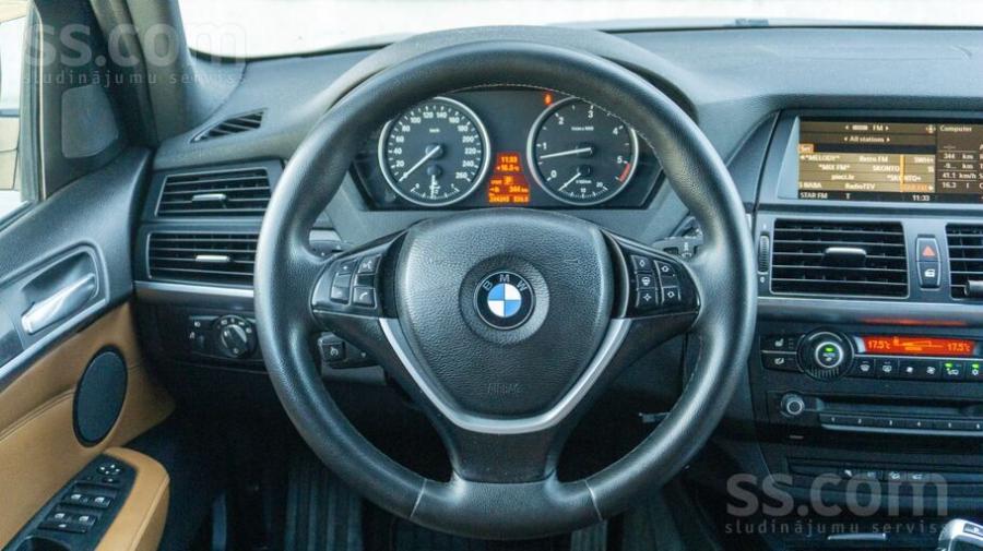 Black BMW X5 2008 in Riga, with an engine capacity of 3.00 L and mileage of 284 thousand km for 9490 €, photo 15 on AUTOMOTO.COM.LV