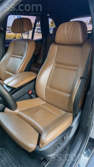 Black BMW X5 2008 in Riga, with an engine capacity of 3.00 L and mileage of 284 thousand km for 9490 €, photo 23 on AUTOMOTO.COM.LV