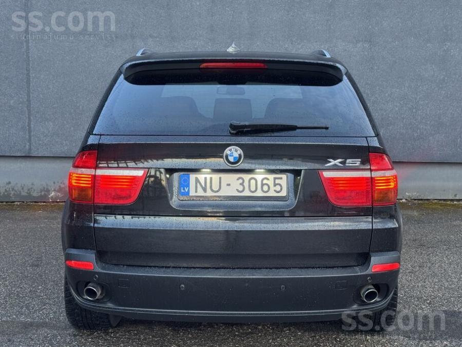 Black BMW X5 2008 in Cesis, with an engine capacity of 3.00 L and mileage of 296 thousand km for 8490 €, photo 8 on AUTOMOTO.COM.LV