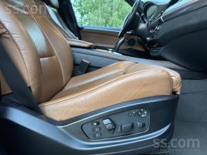 Black BMW X5 2008 in Cesis, with an engine capacity of 3.00 L and mileage of 296 thousand km for 8490 €, photo 12 on AUTOMOTO.COM.LV