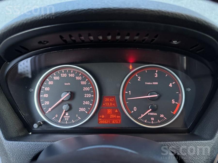 Black BMW X5 2008 in Cesis, with an engine capacity of 3.00 L and mileage of 296 thousand km for 8490 €, photo 19 on AUTOMOTO.COM.LV